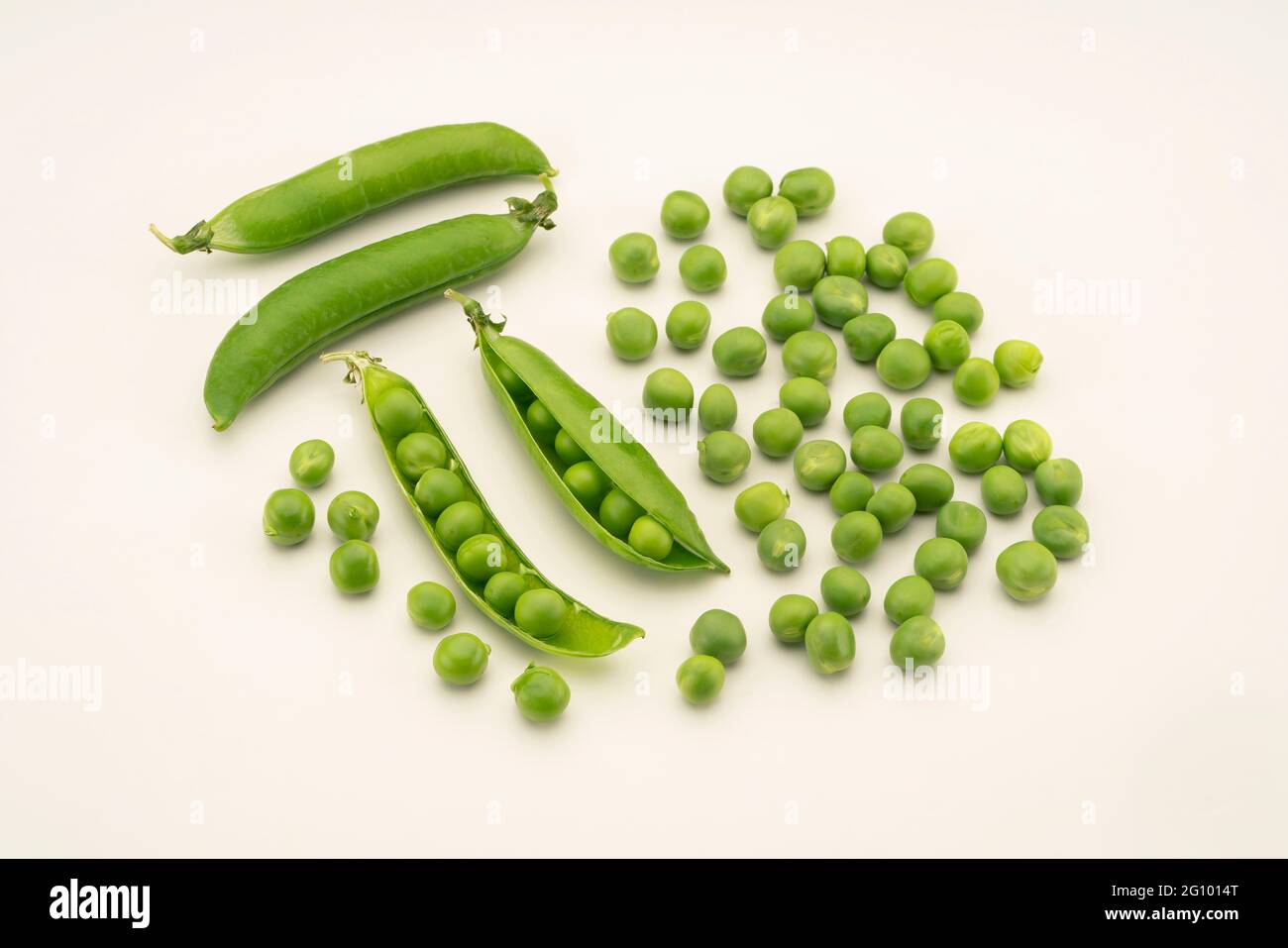 Closeup top view of fresh green peas,Pisum Sativum, pods and seeds ...