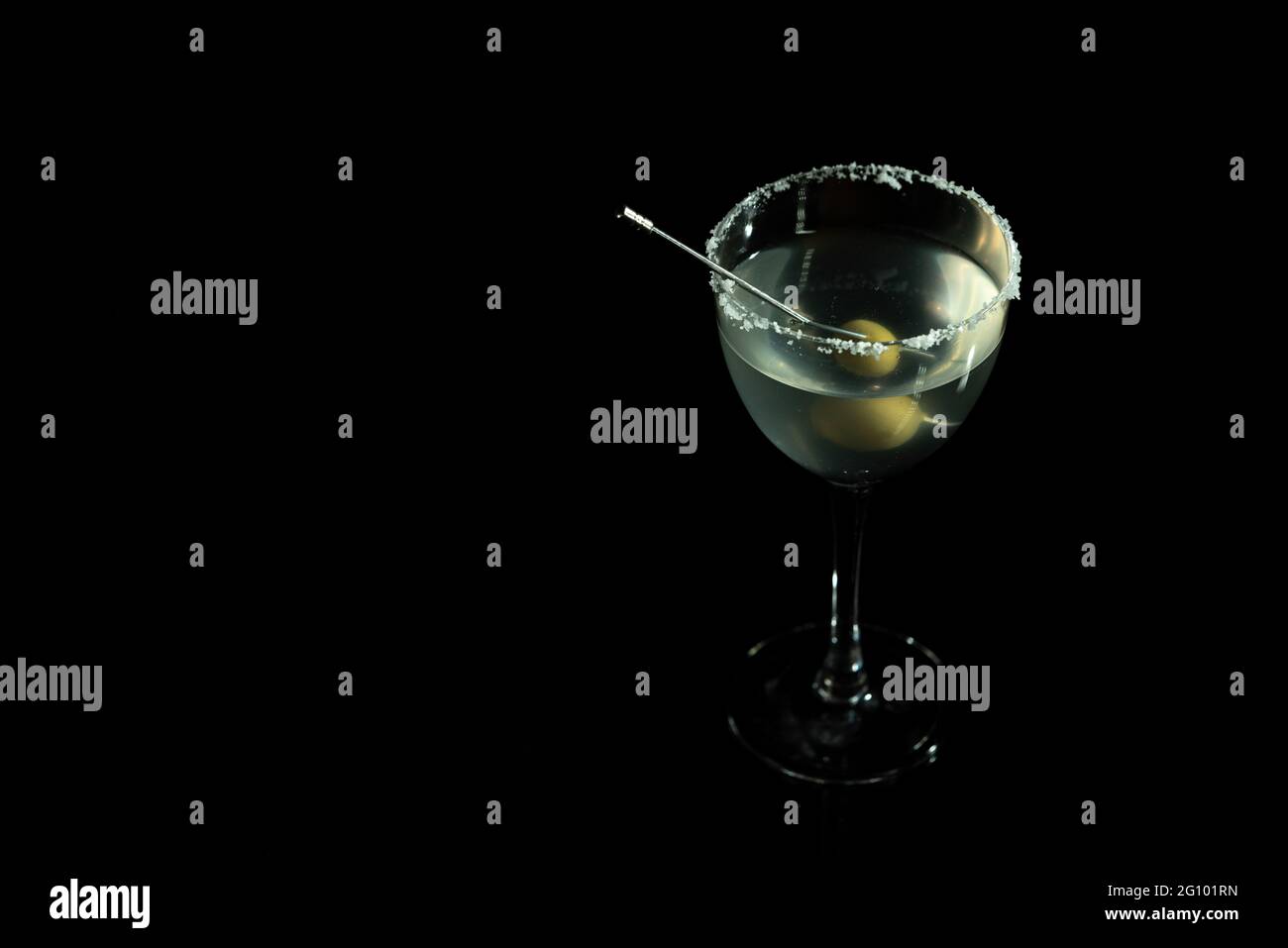 Luxury cocktail glass on black background. High end beverage in bar ...