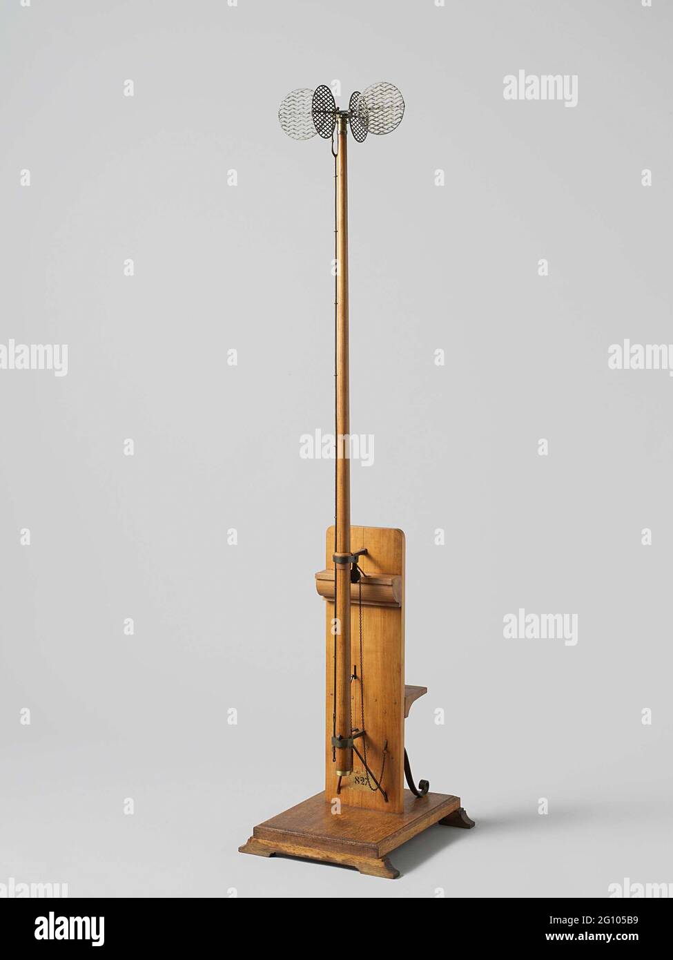 Model or A Time Signal. Model of a signal pole on a wooden base plank ...