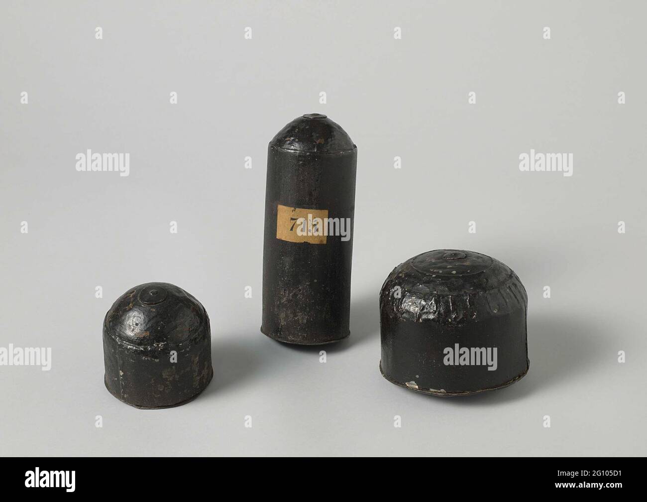 Model of a Metal cartridge. Empty cylinder-shaped cardus, painted black ...