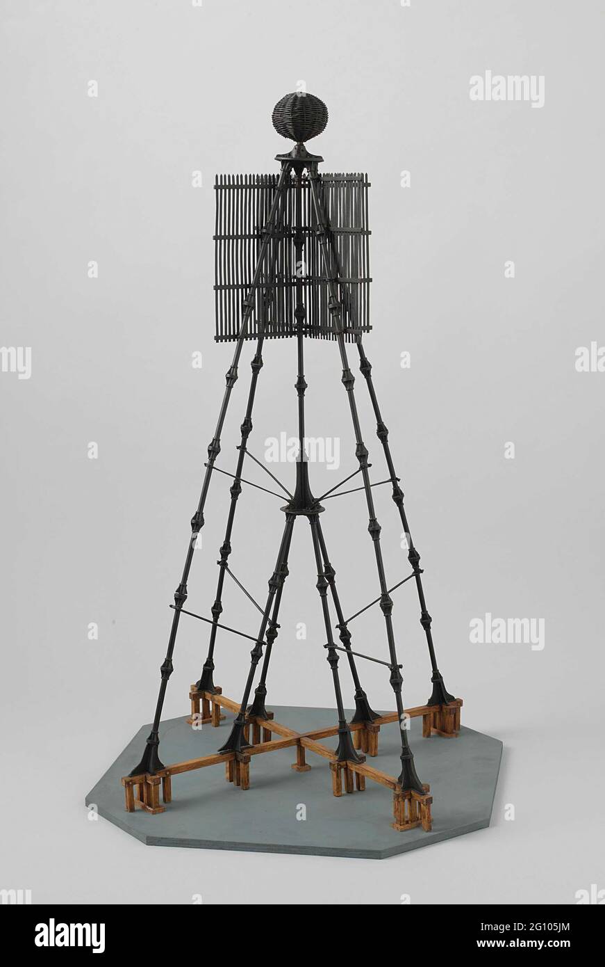 Model or a country beacon. Wooden model of an iron, painted black and ...