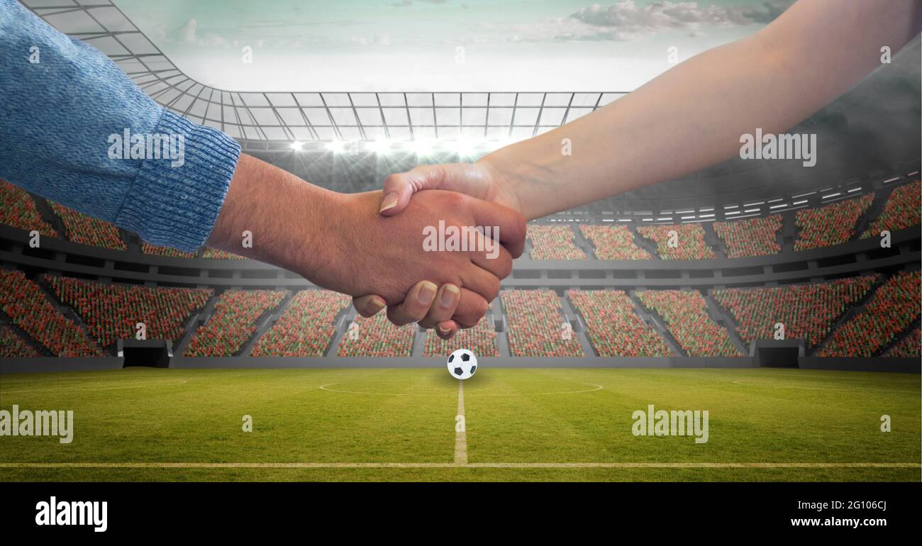 Football shaking hands hi-res stock photography and images - Alamy