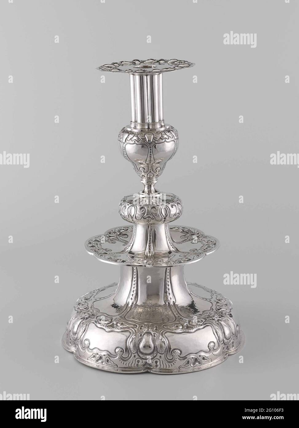 Silver candlestick. Candlestick of silver. The round, lobed foot, is ...