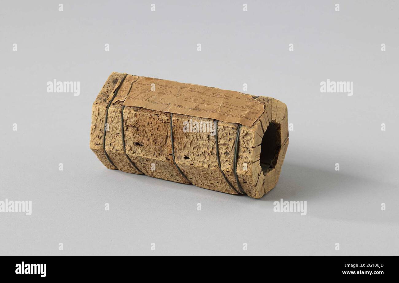 Sample of Cork Insulation for Steam Pipes. Round metal tube with a cork ...