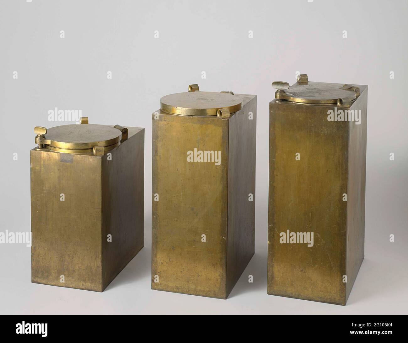 Powder Chest. Three brass gunpowder boxes of identical rectangular base ...