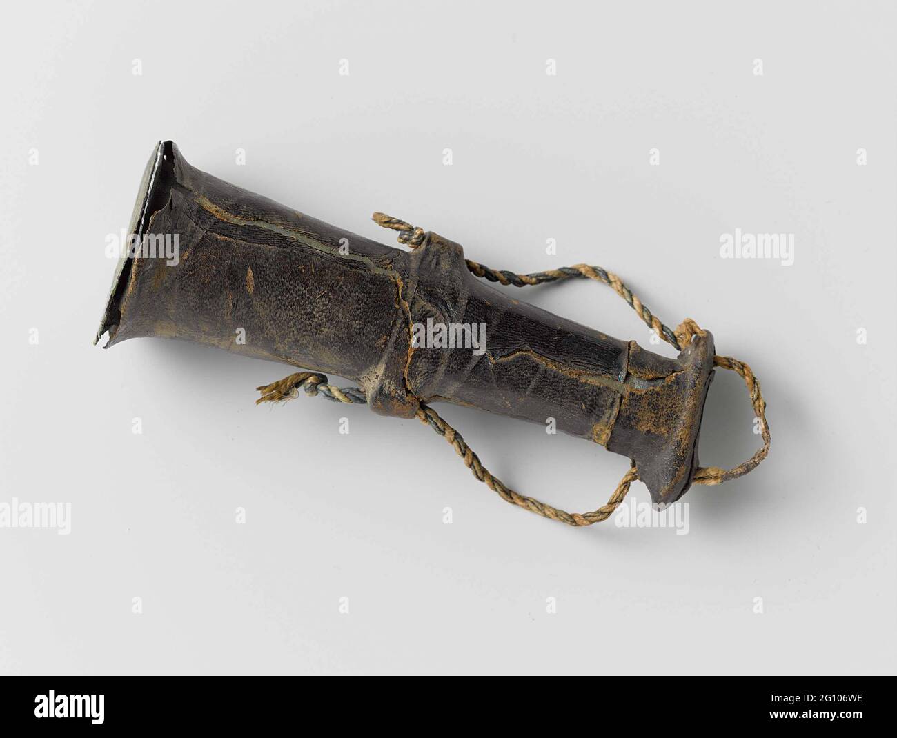 Musket size. Musket size of brass, with leather sleeve and a leather ...