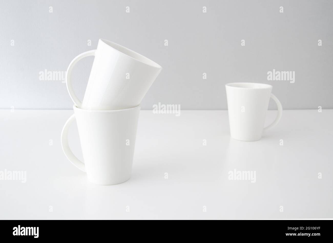 White empty cups with elegant and minimal design on white background ...