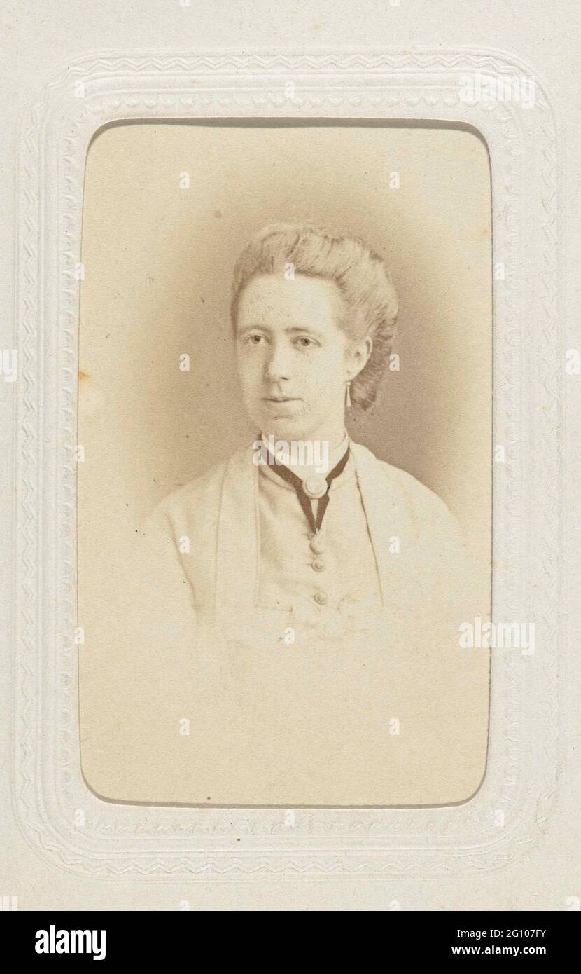 Studio portrait of a woman with raised hair Stock Photo - Alamy