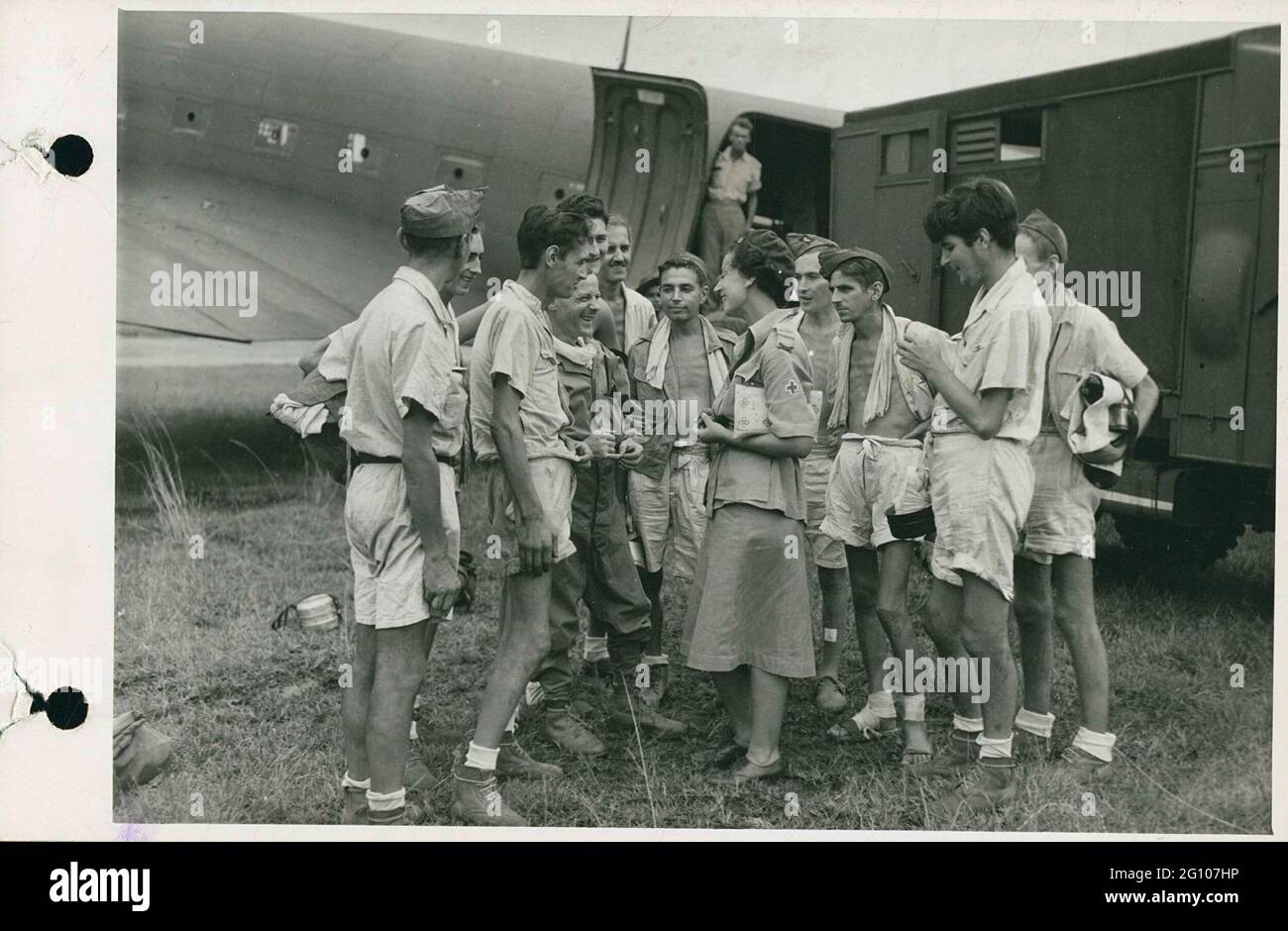 Dutch internees arrive safely in Singapore. A twelve-wide laughing men ...