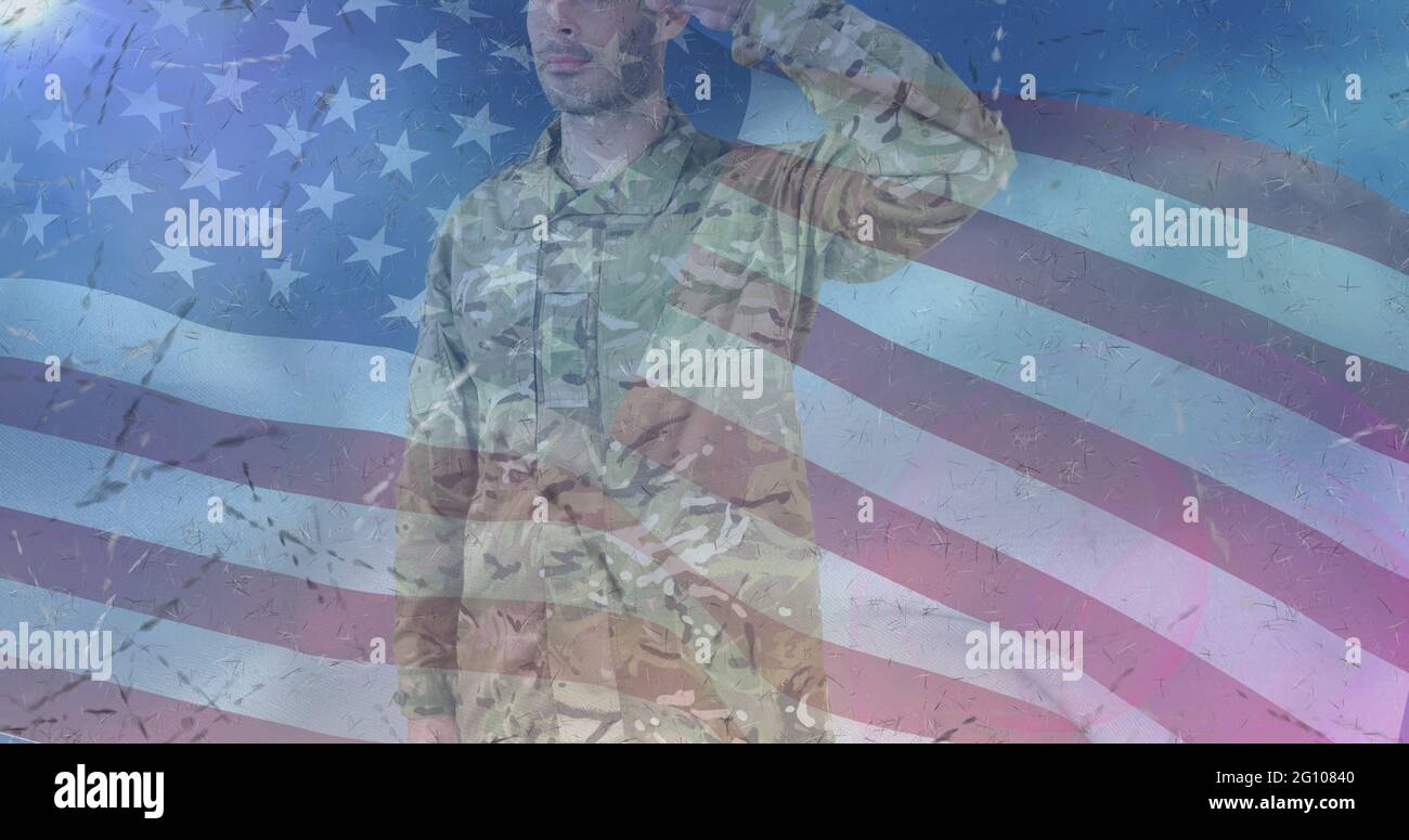 Composition of male soldier saluting over american flag Stock Photo - Alamy