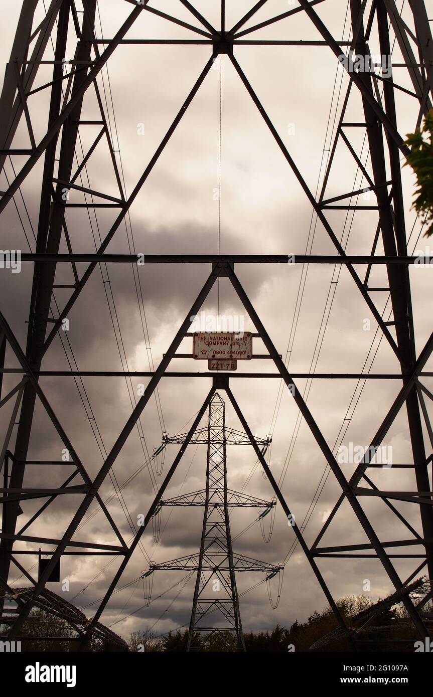 A view looking through an electricity pylon, transmission tower, to ...