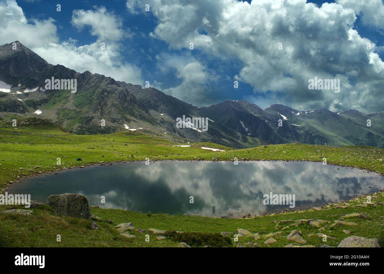 This unique mountain view and pond view, taken from a high hill by ...