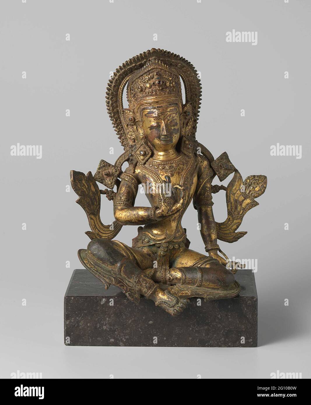 Indra. Indra, the king of the gods, is seated in the relaxed pose known ...