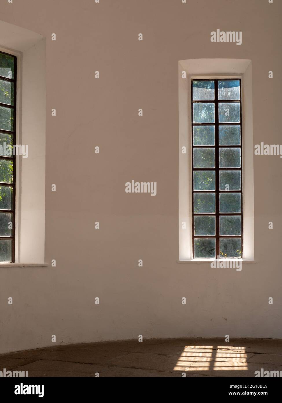 Light falling through the beautiful wooden high french window over the ...