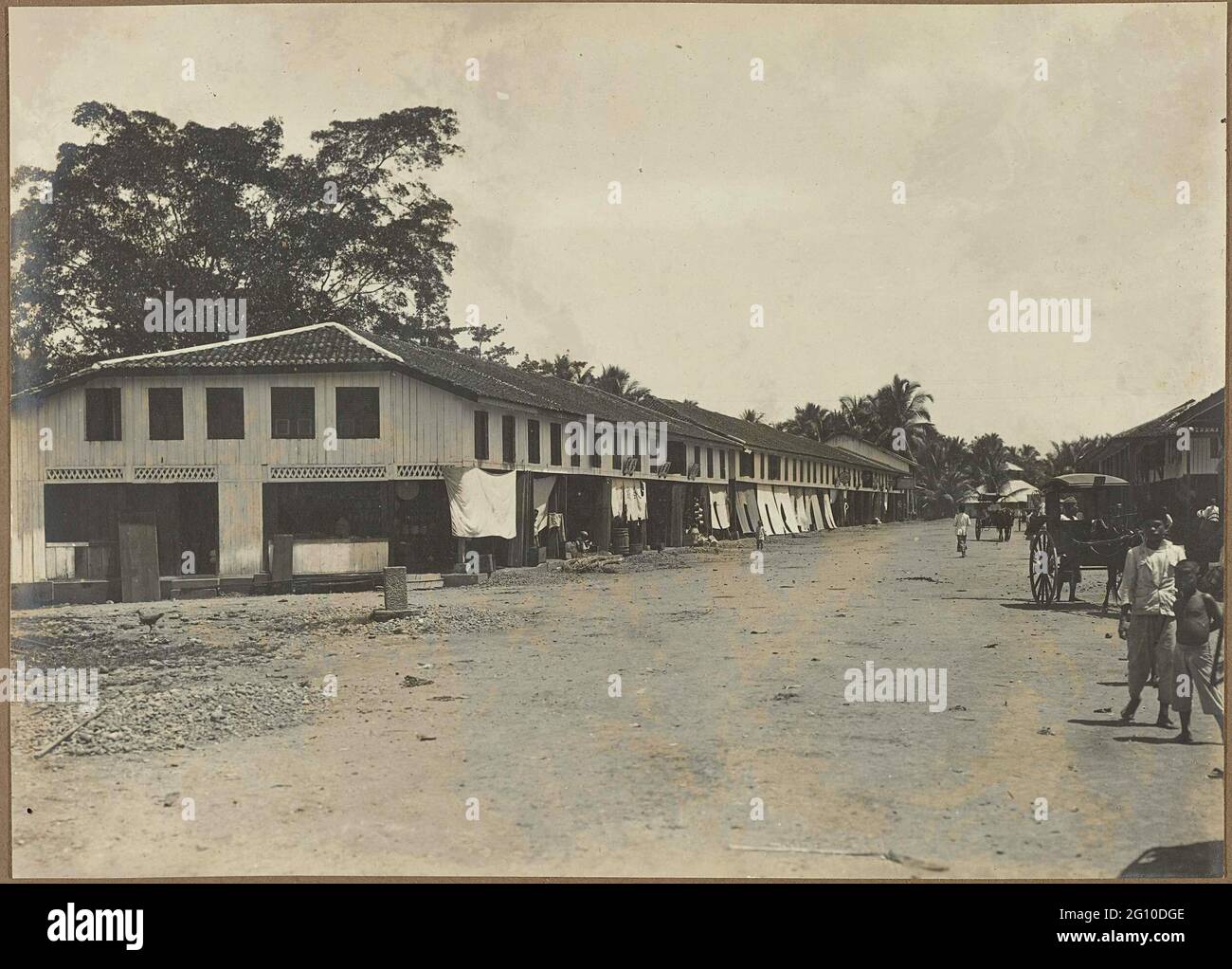 Street face. View in a street, probably in Medan, with buildings that ...