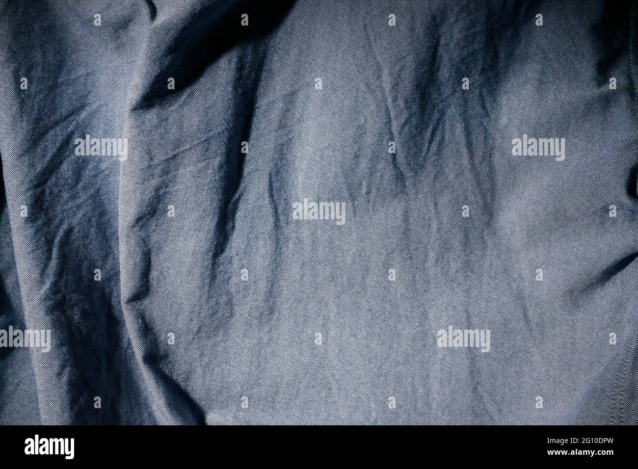 Dramatic lighting on denim fabric. Background, wallpaper Stock Photo ...