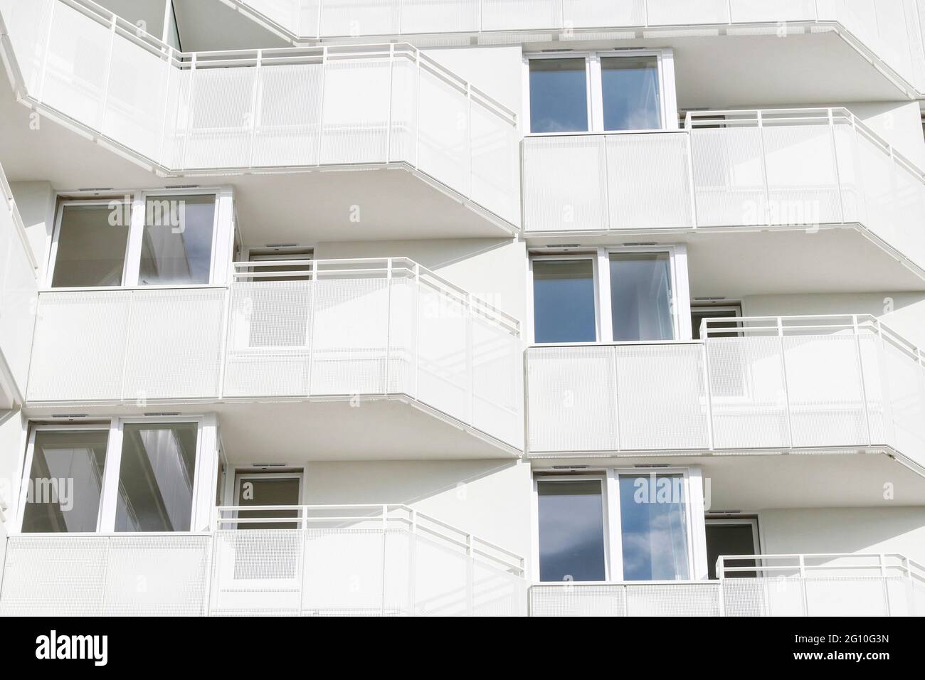 Modern all white apartment building Stock Photo - Alamy