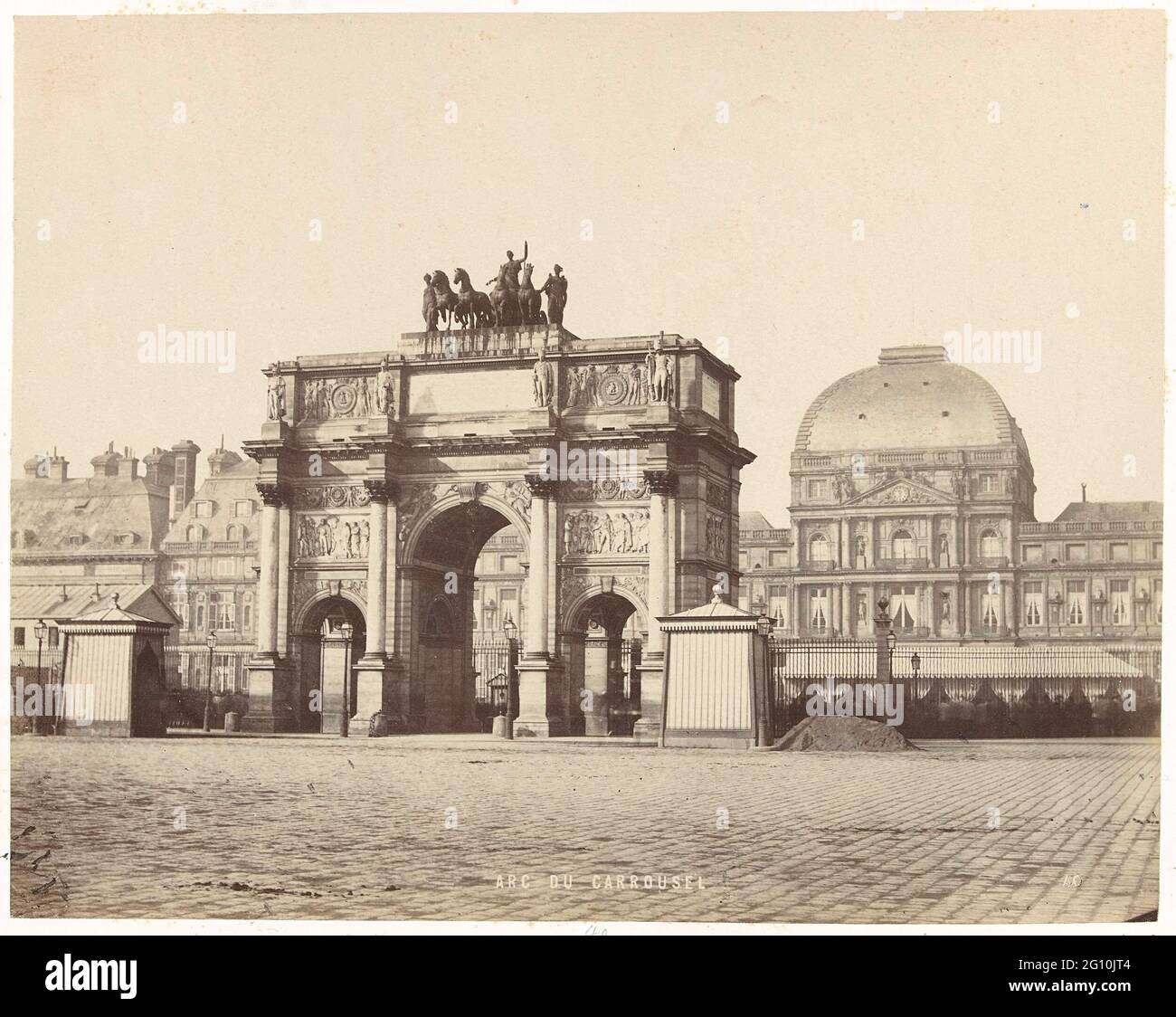 The Arc de Triomphe du carousel, with the Louvre in the background; Arc ...