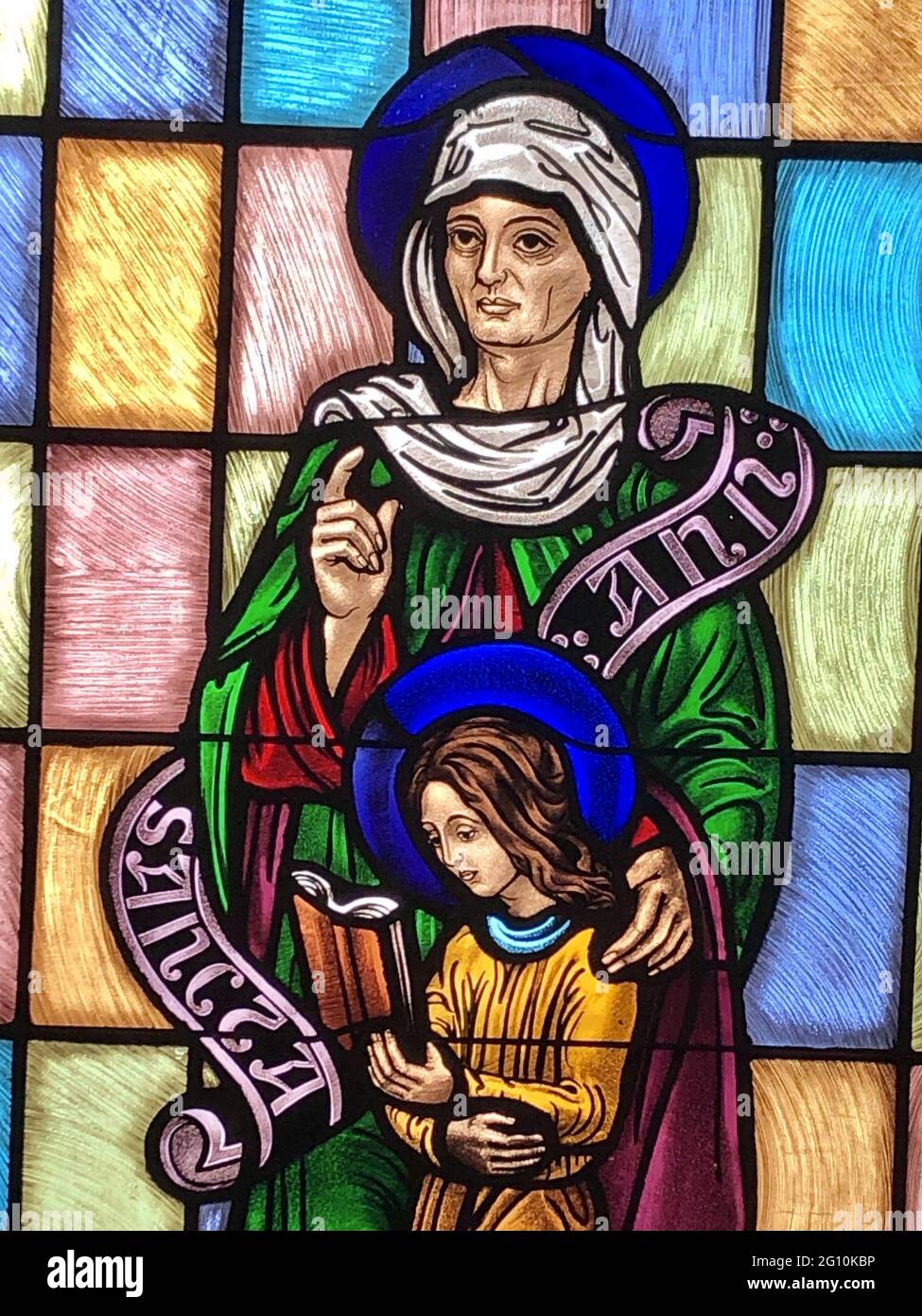 BIOXI, UNITED STATES - Jun 01, 2021: Stained glass window of Saint Anne ... BIOXI, UNITED STATES - Jun 01, 2021: Stained glass window of Saint Anne ...