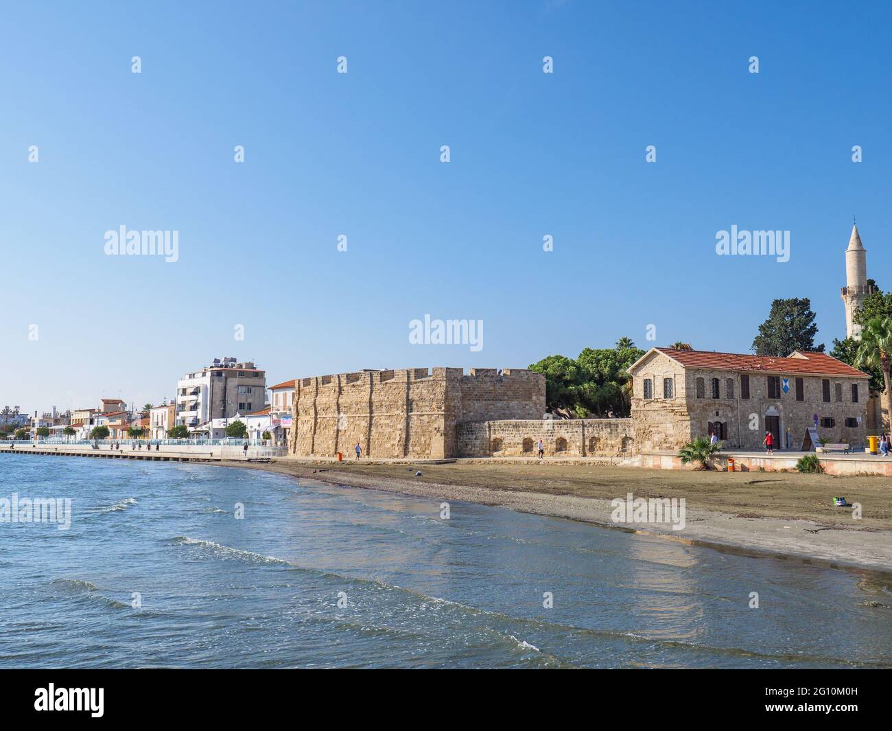View from the pier over the ancient Larnaca fortress and beach with ...
