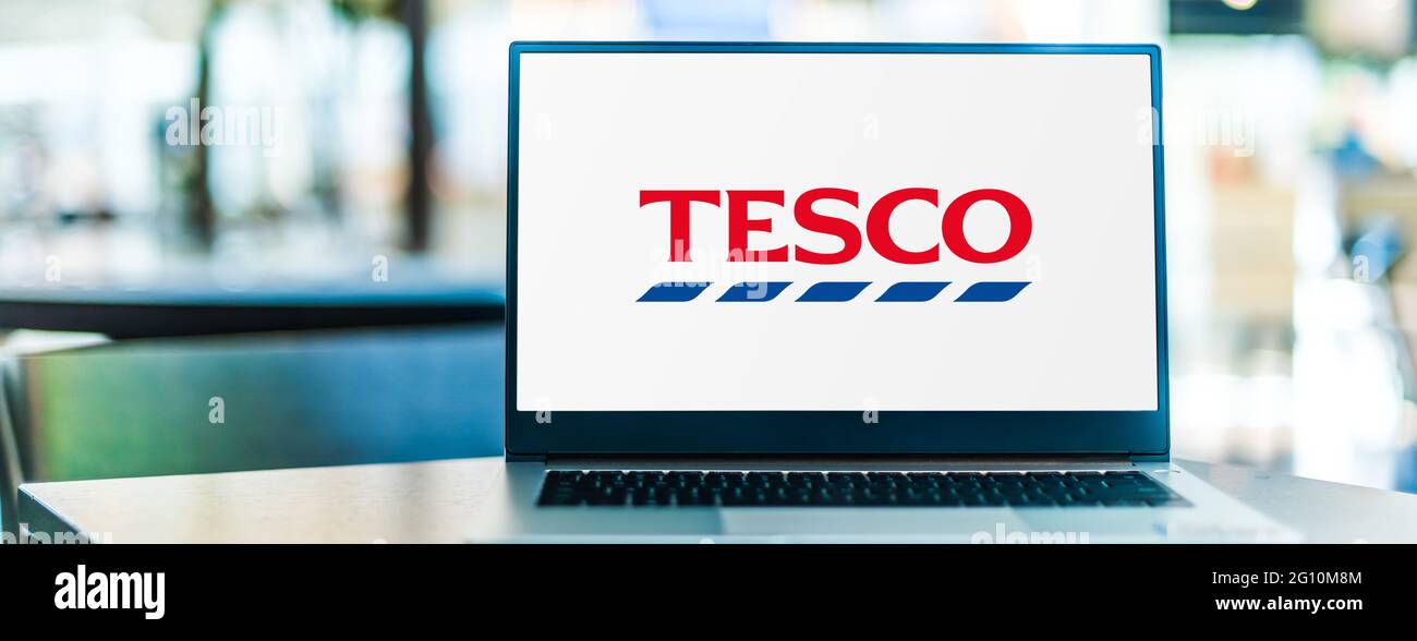 POZNAN, POL - MAY 15, 2021: Laptop computer displaying logo of Tesco, a ...