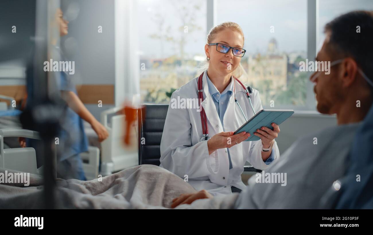 Hospital Ward: Resting in Bed Caucasian Male Patient Listens to ...