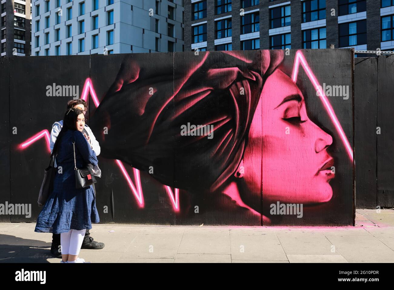 London, UK. 01 June 2021. Street Art London in Aldgate. Neon style ...