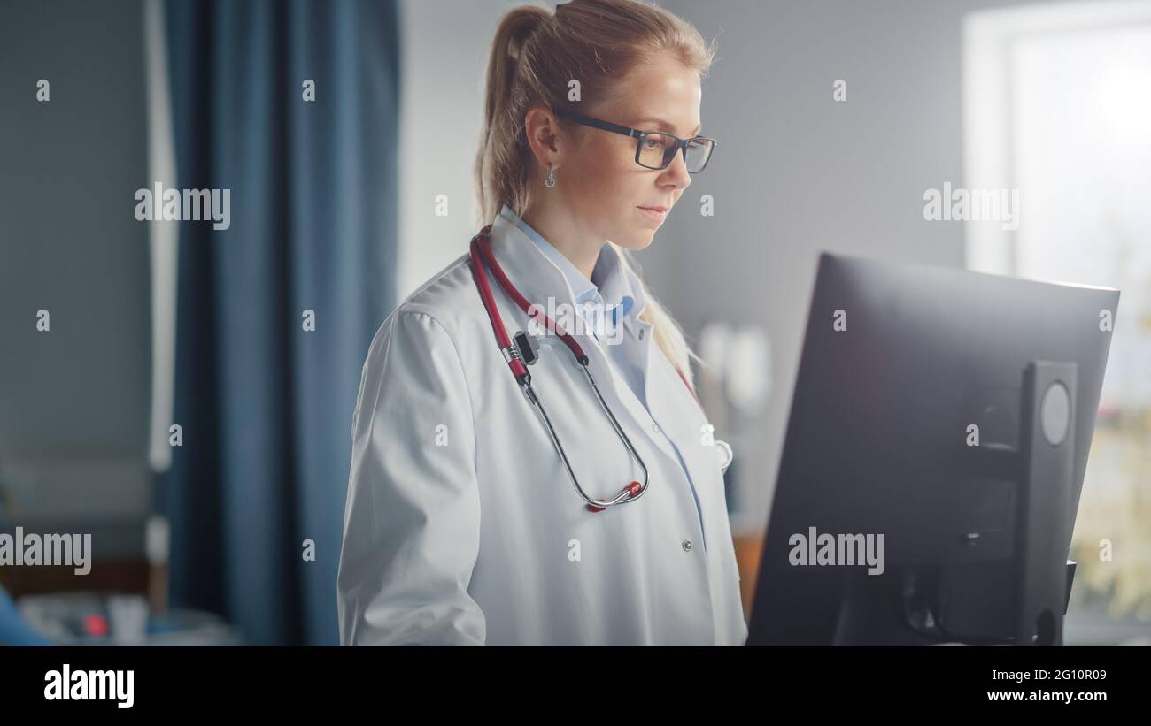 Hospital Ward: Professional Smiling Caucasian Female Doctor Wearing Lab ...