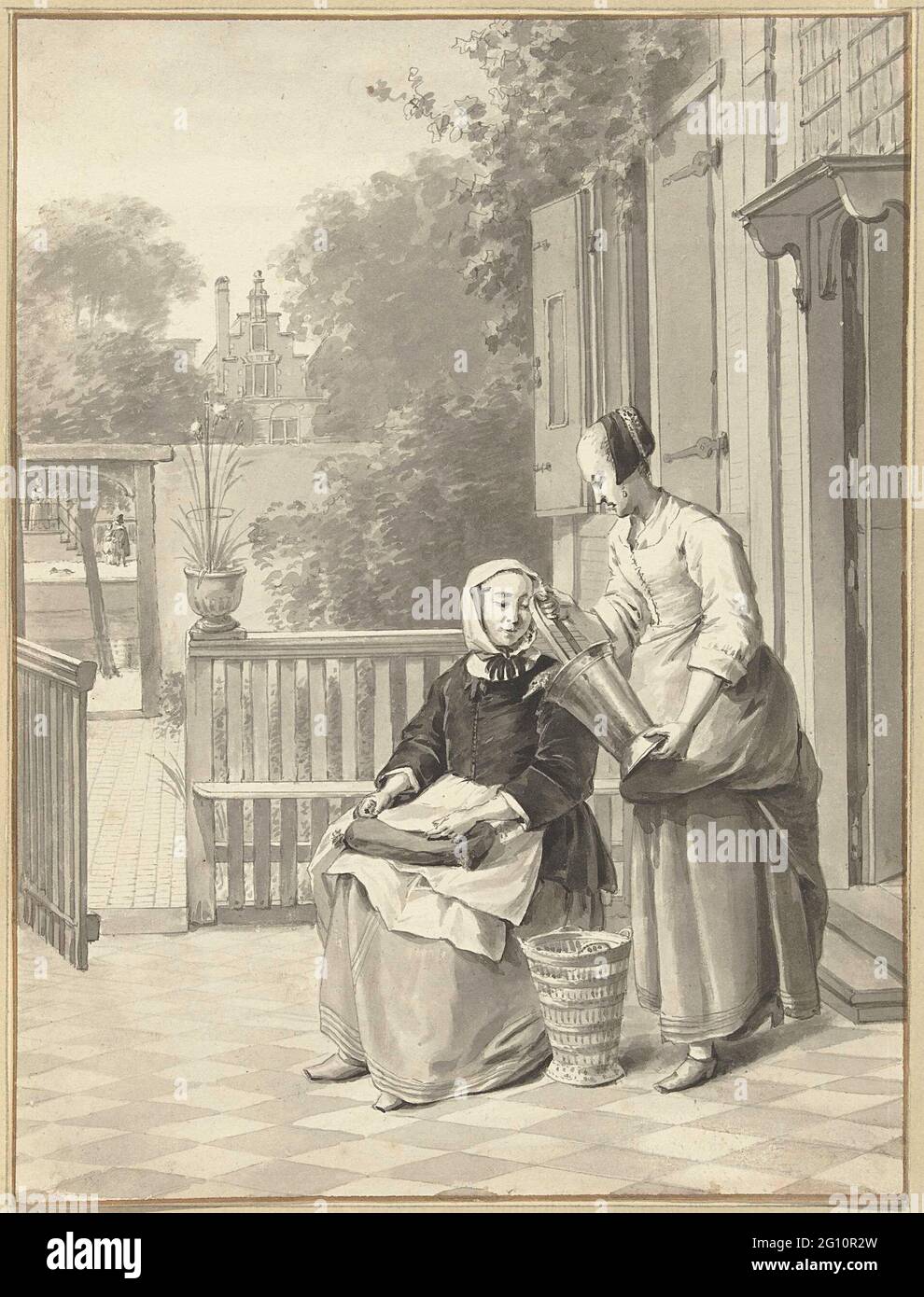 Lady with kitchen maid for a house Stock Photo - Alamy
