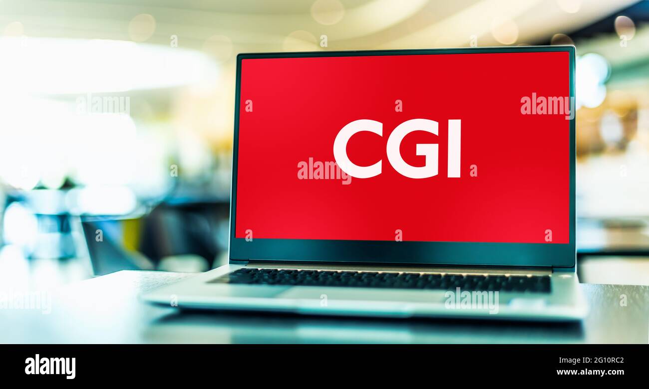 POZNAN, POL - MAY 1, 2021: Laptop computer displaying logo of CGI, an ...