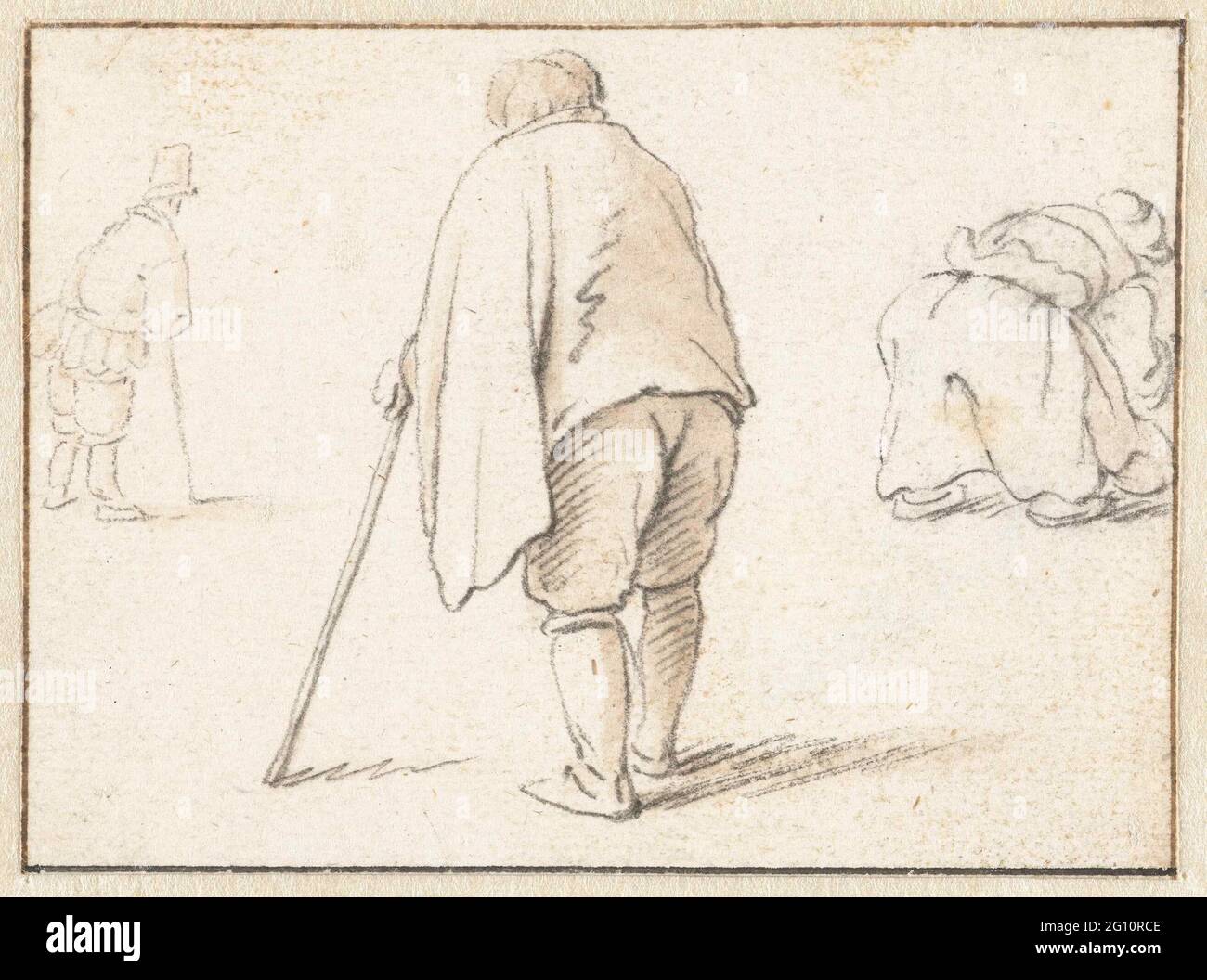 Standing man with a stick. A standing man with a stick, in the ...