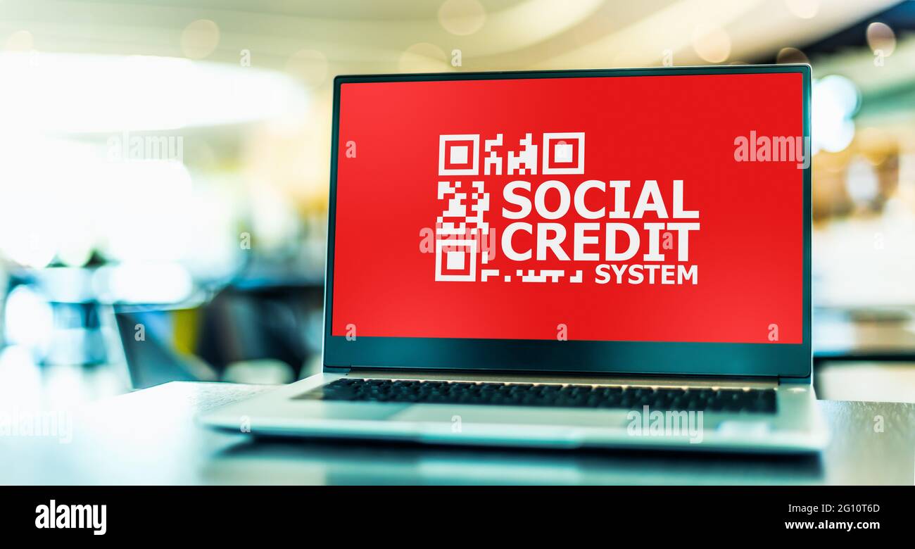 Laptop computer displaying the sign of Social Credit System Stock Photo ...
