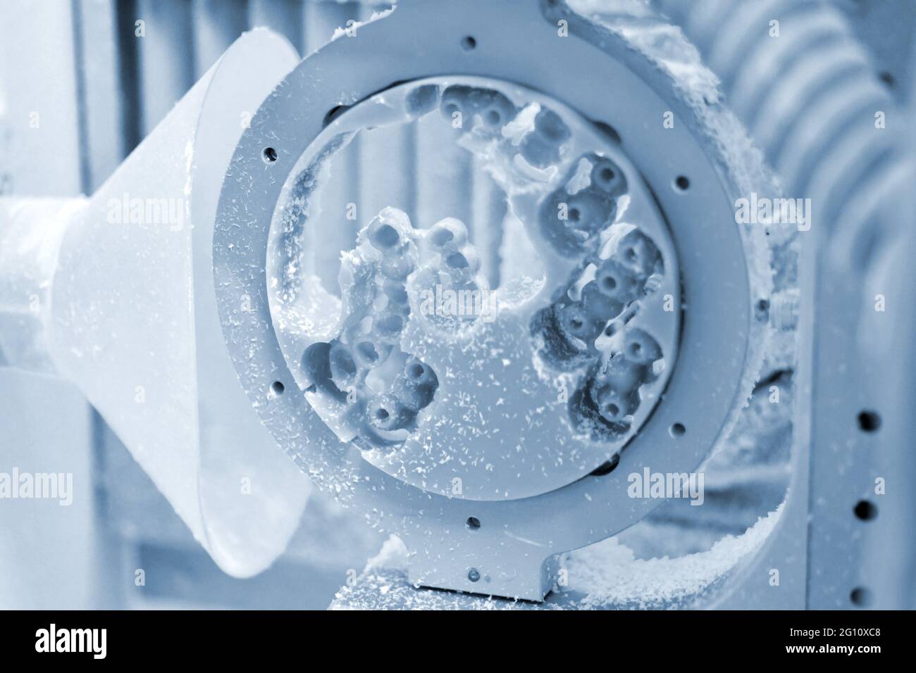 Dental milling machine carving out shape of human teeth Stock Photo - Alamy