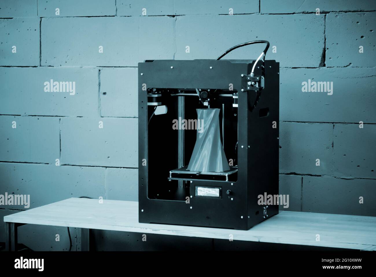 3D printer working close up. Automatic three dimensional 3d printer ...