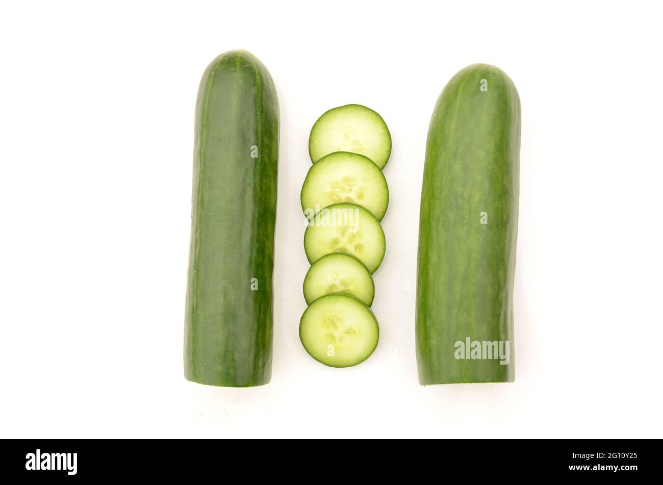 closeup the pair of sliced green ripe cucumber isolated on white ...