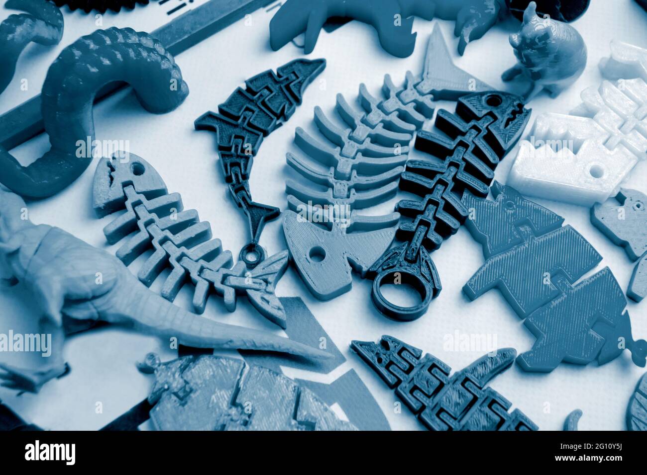 Models printed by 3d printer. Bright colorful objects printed on a 3d ...