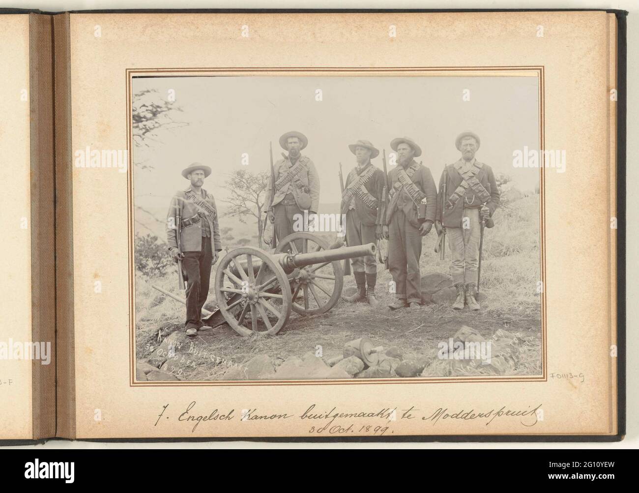 Men, presumably farmers, with a pasted English cannon to mud sprout ...