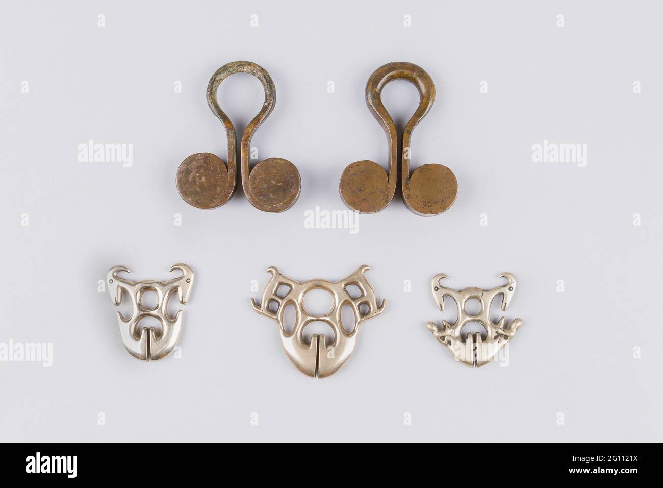 Antique metal objects isolated on a white background Stock Photo - Alamy