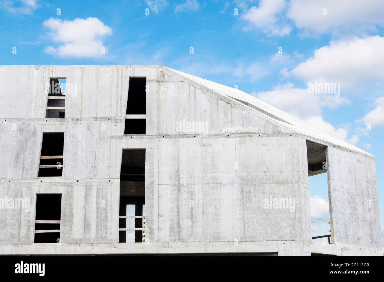 Unfinished abandoned concrete building. Modern architecture concept ...
