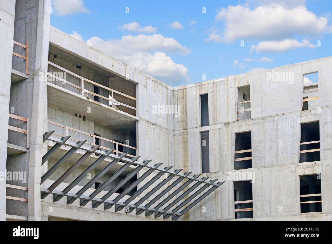 Unfinished abandoned concrete building. Modern architecture concept ...