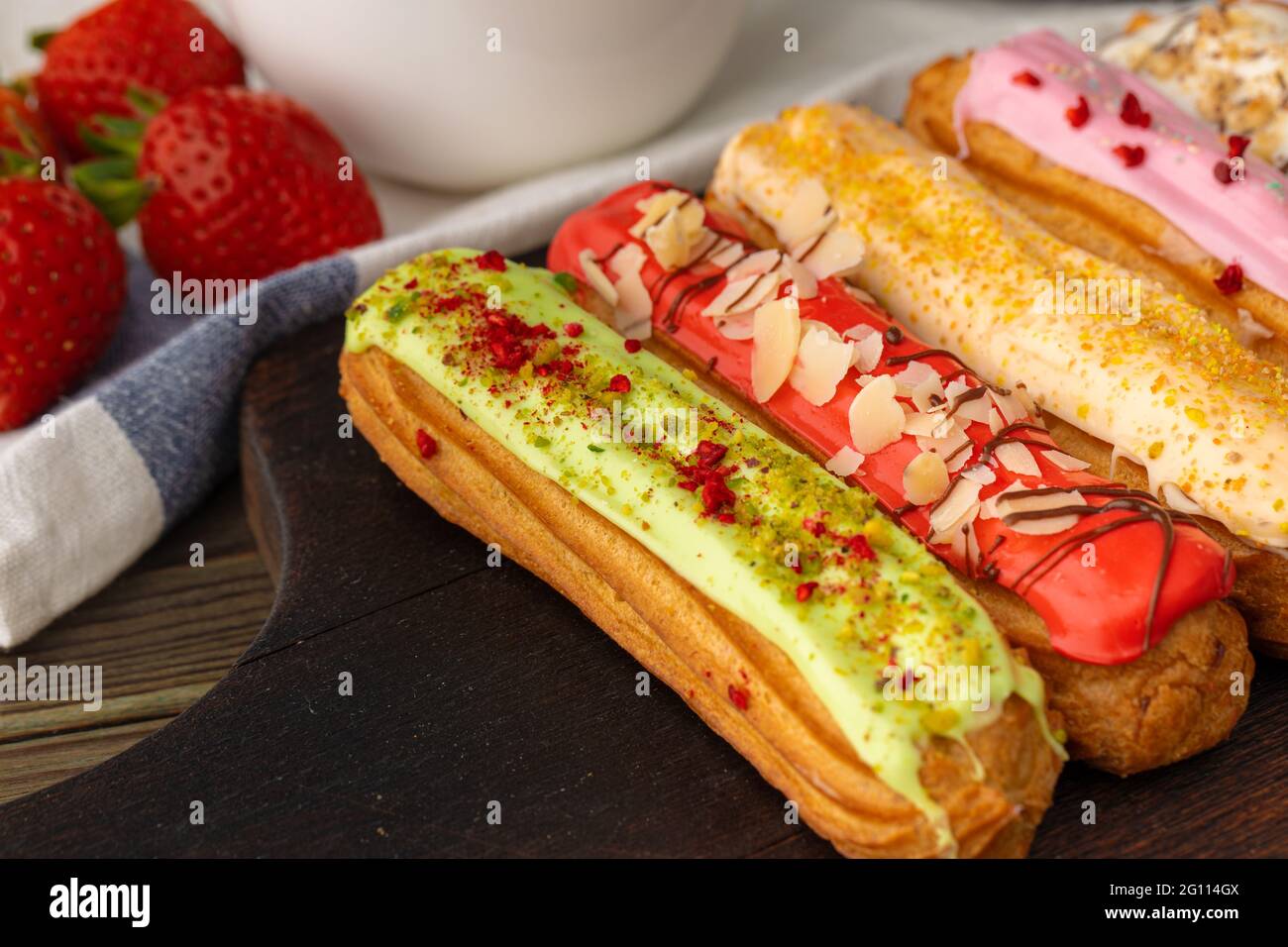 Eclair cake close up on wooden table Stock Photo - Alamy