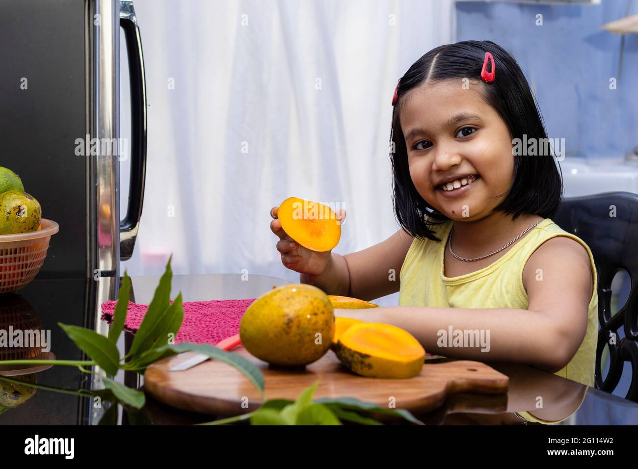 Cute Baby Eating Mango