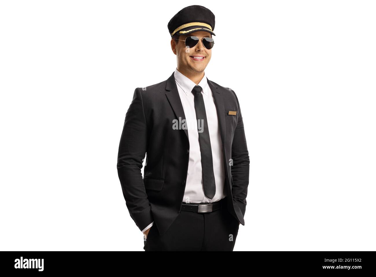 Young professional driver in a uniform and sunglasses smiling at camera ...