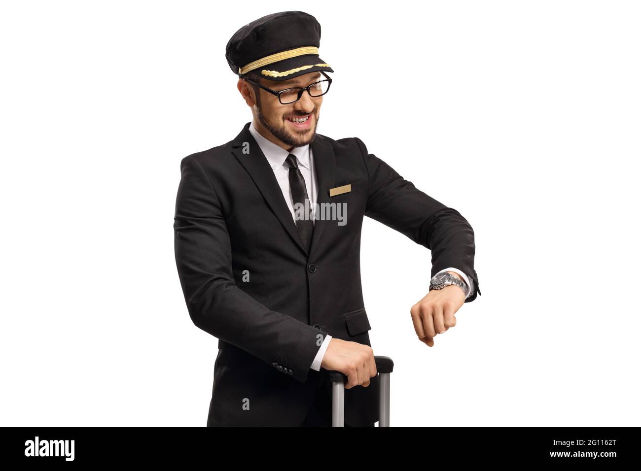 Pilot with a suitcase checking his watch isolated on white background ...
