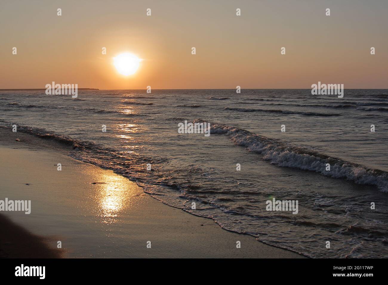 the beautiful and colorful sunset at the beach Stock Photo - Alamy