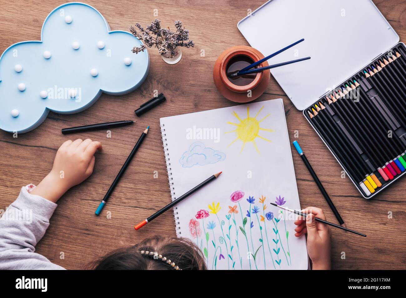 Child drawing top view. Artwork workplace with creative accessories ...
