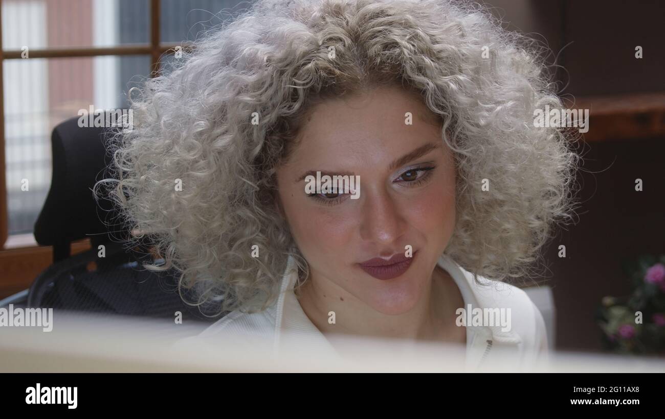 Woman on computer webcam hi-res stock photography and images - Alamy