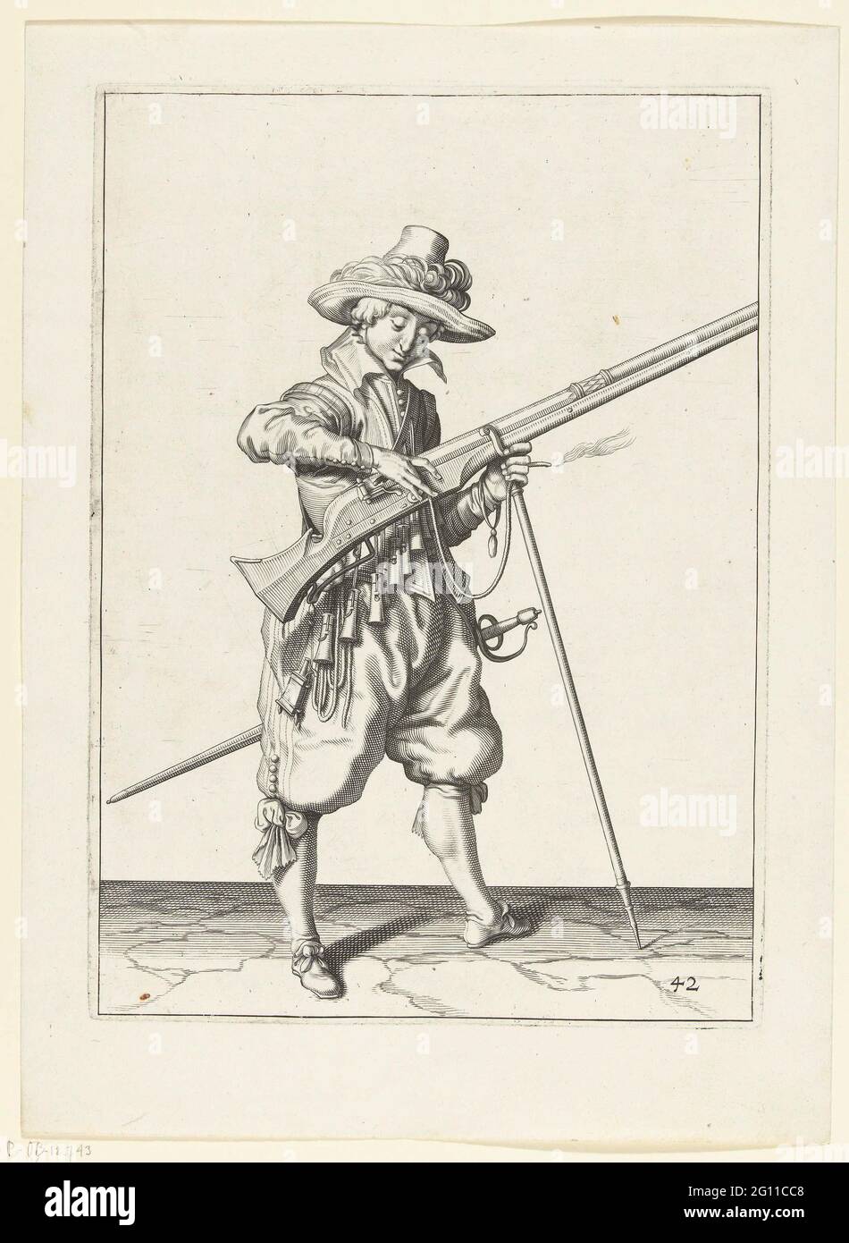 Soldier on guard that gives the wick on the rooster of his musket the ...