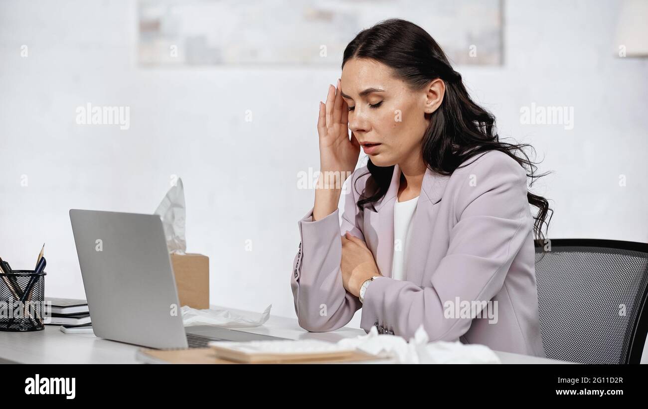 Young businesswoman laptop having headache hi-res stock photography and ...