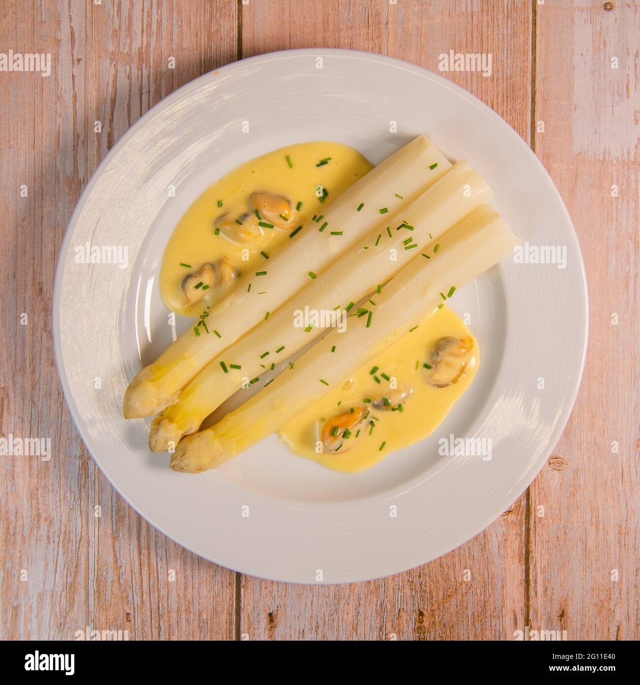 Large white asparagus and shell mousseline recipe Stock Photo - Alamy